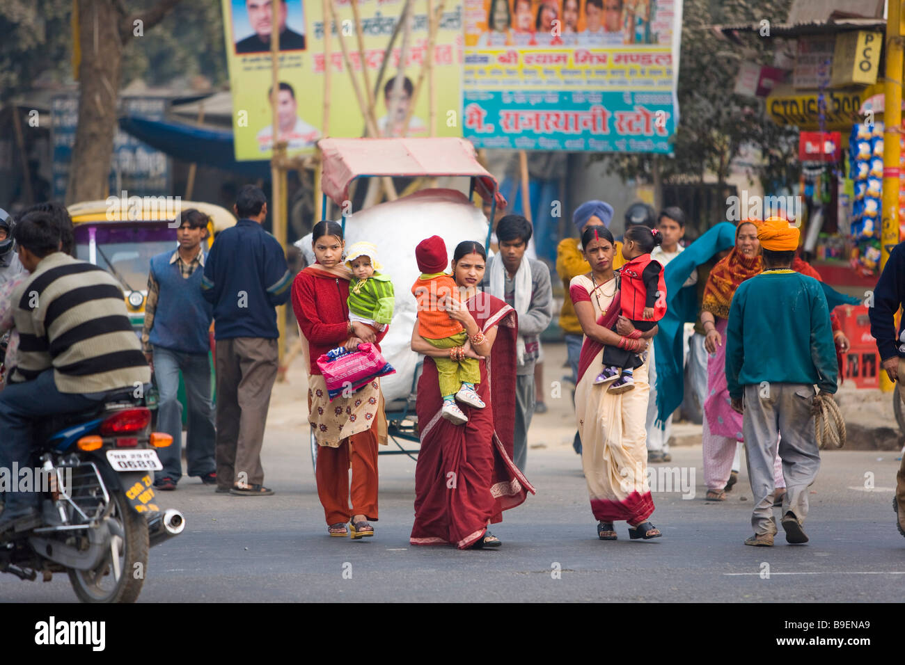 Indian woman crossing road hi-res stock photography and images - Alamy