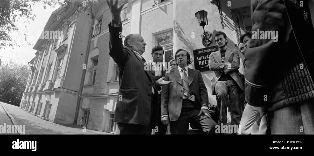 Playwright Viktor Rozov left and his students next to the Institute for ...