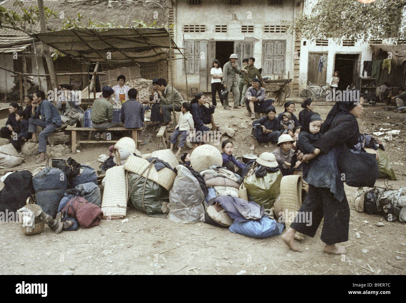 Members of Nung ethnic group leave their home territories occupied by ...