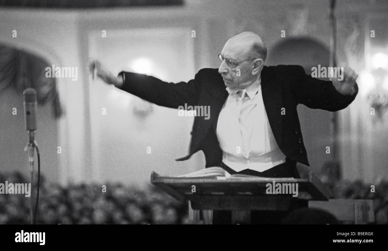 Composer Igor Stravinsky conducting an orchestra Stock Photo - Alamy