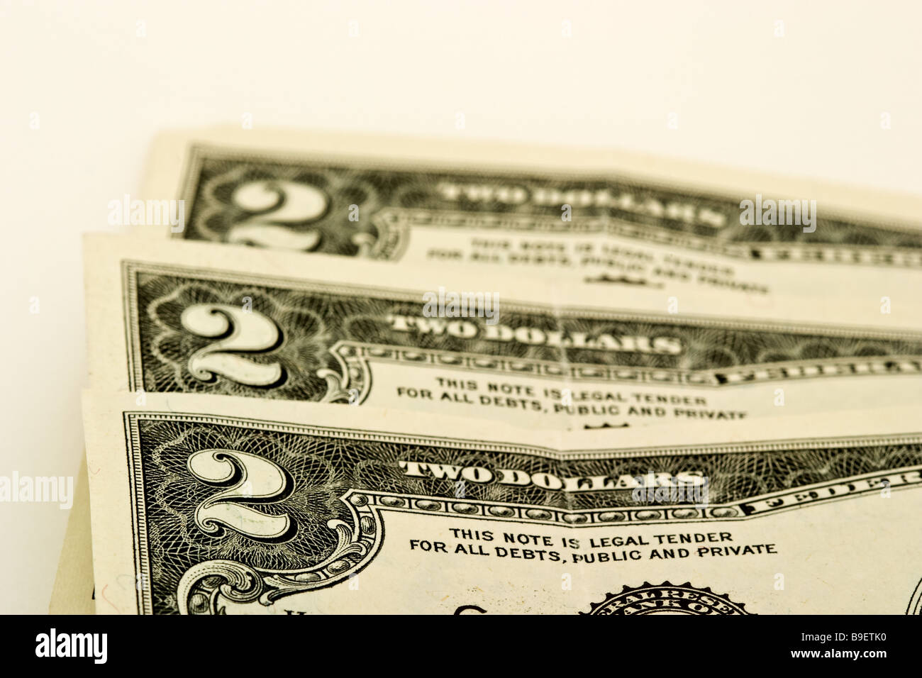 Three American two dollar bills Stock Photo - Alamy