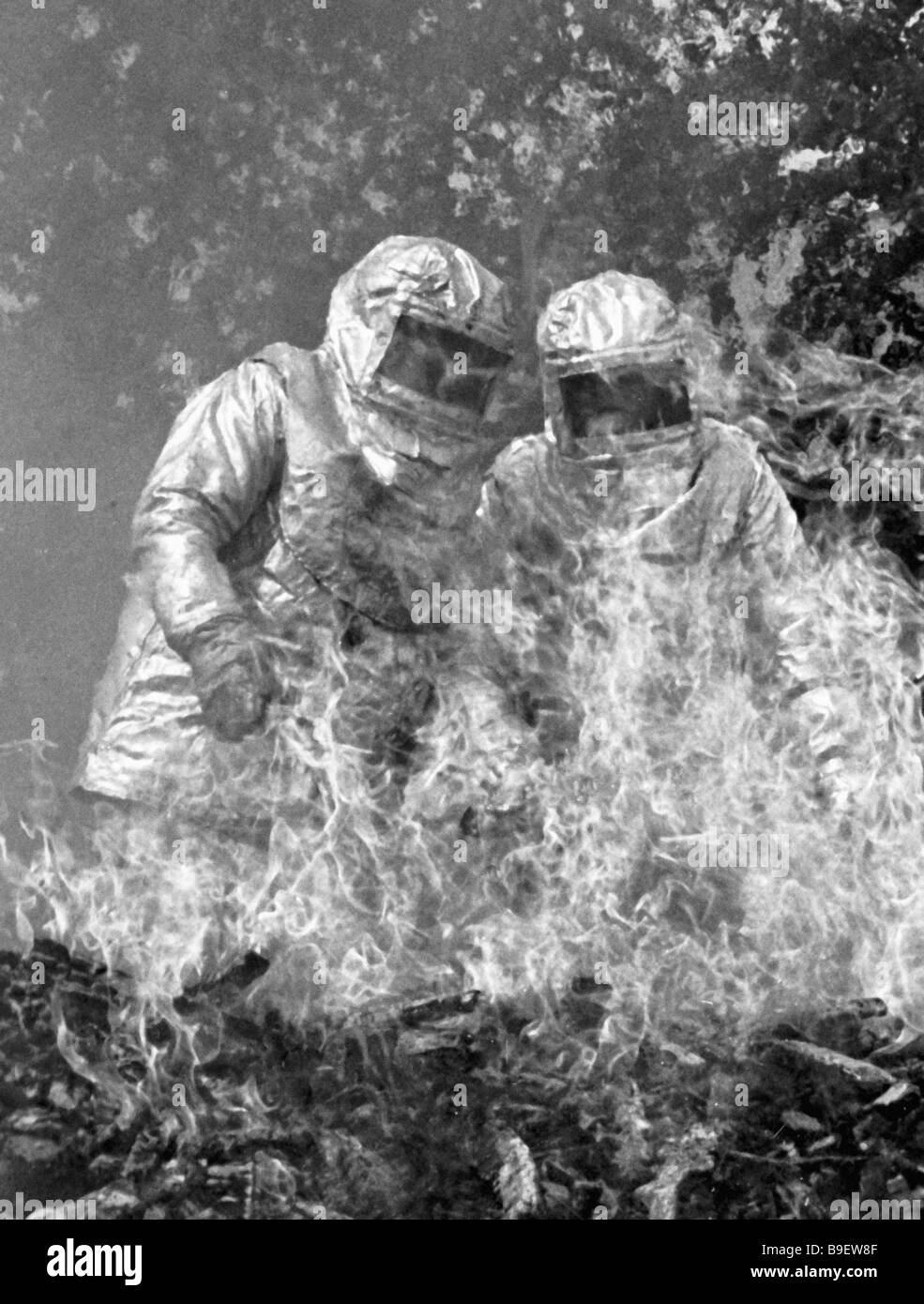 Testing heat resistant suits in the open flame Stock Photo - Alamy