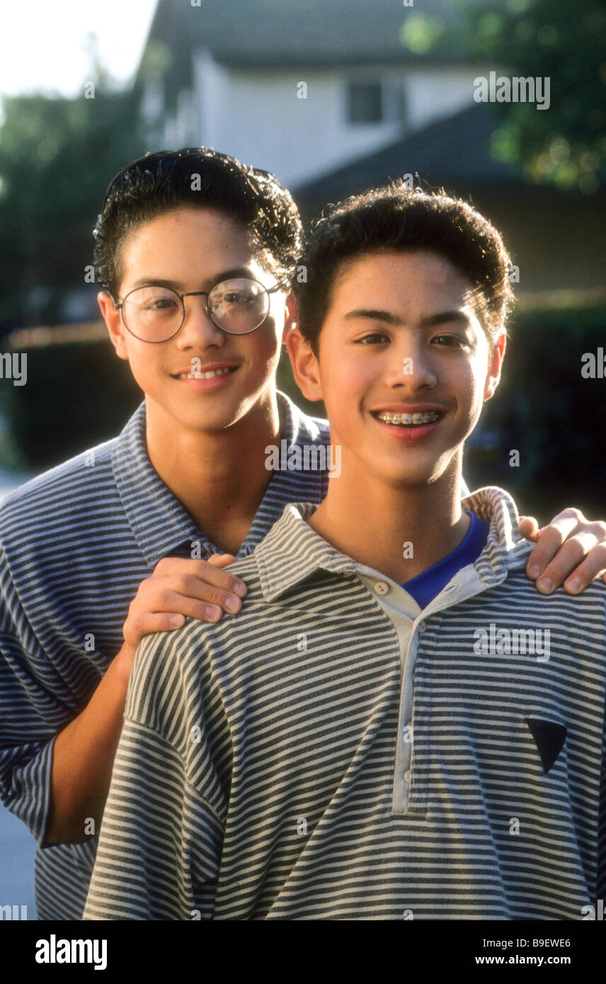 sibling family portrait smile serious face happy support share minority ...