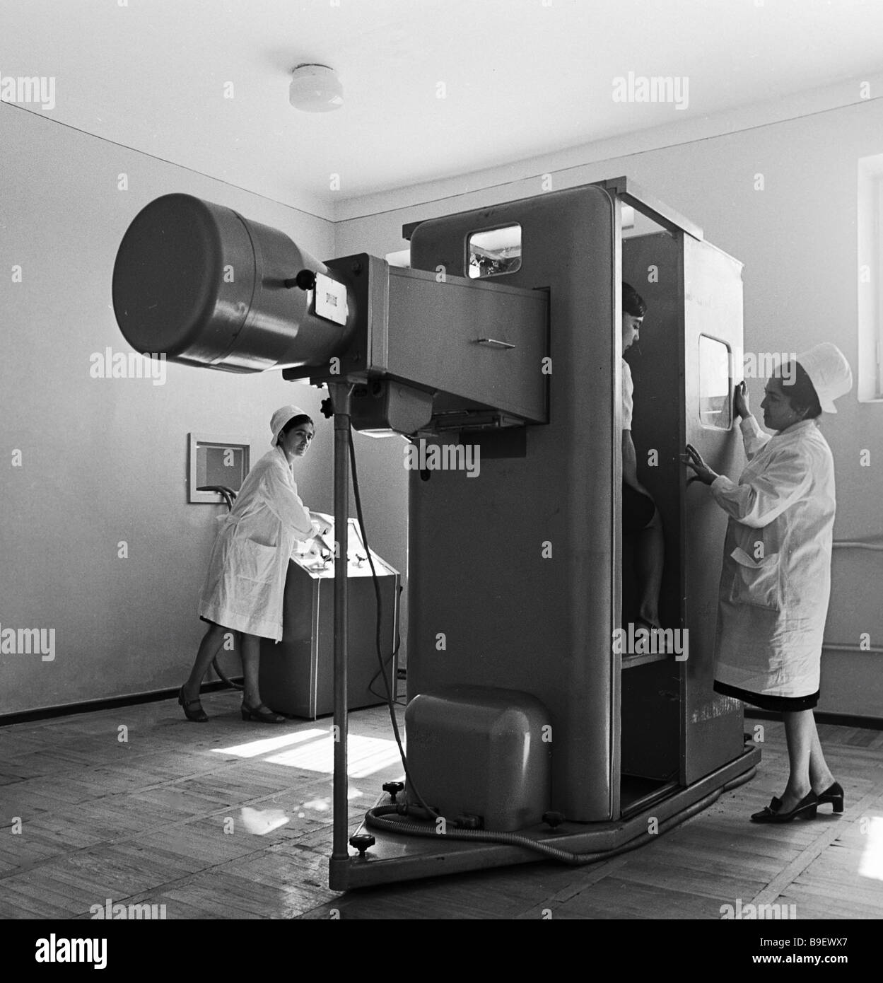 Radiologists are conducting a photo fluorography test of a patient ...