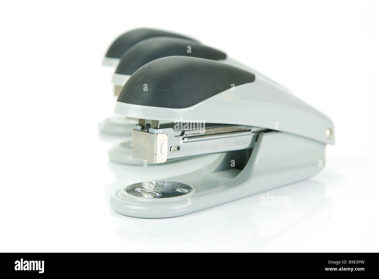 Staplers isolated against a white background Stock Photo - Alamy