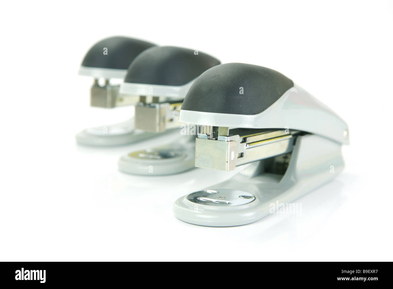 Staplers isolated against a white background Stock Photo - Alamy