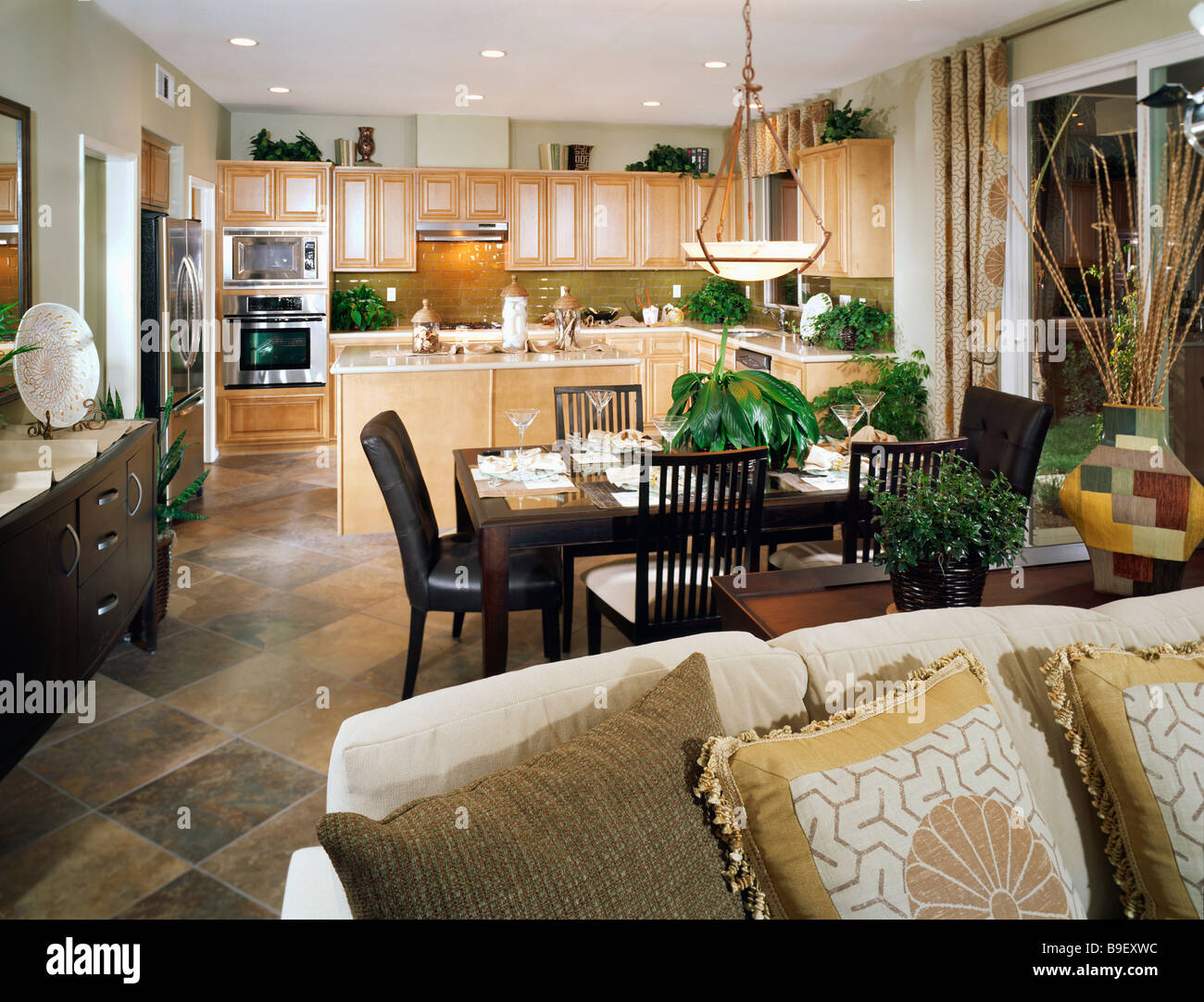 Contemporary dining room and kitchen Stock Photo - Alamy
