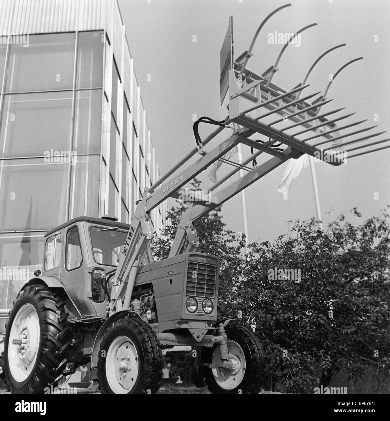 A tractor with a lift up front loader exhibit at a 1972 Moscow farm ...
