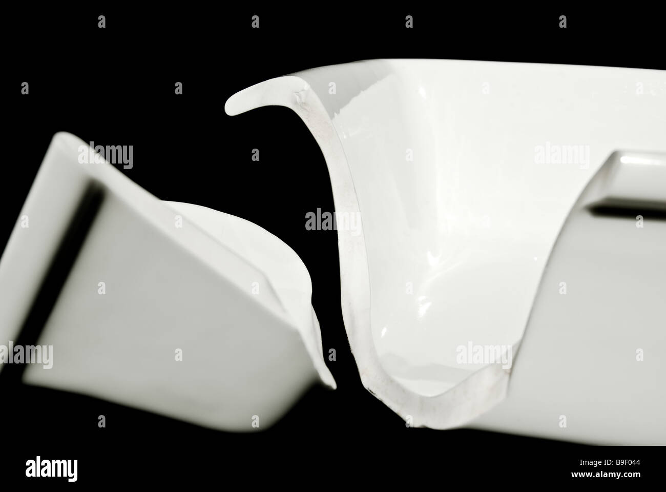 Broken china dish Stock Photo - Alamy