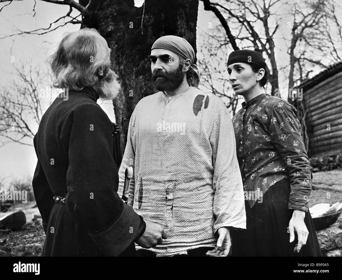 Actor Vasily Kakhniashvili center as Bekin in the film Stepmother ...