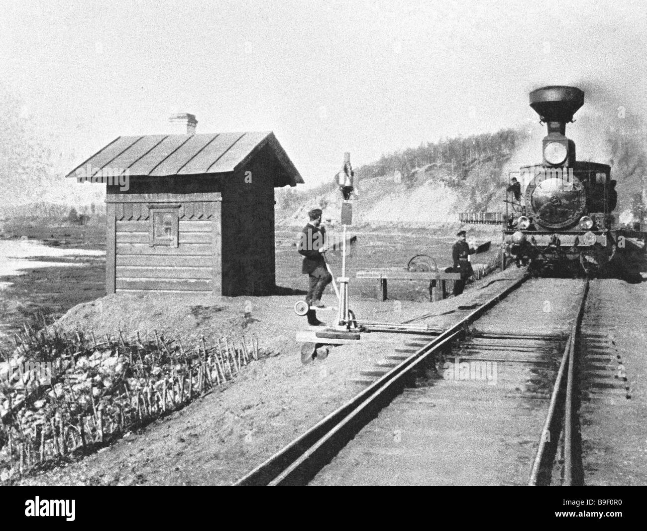 First train moves along Trans Baikal Railroad 1900 Stock Photo - Alamy