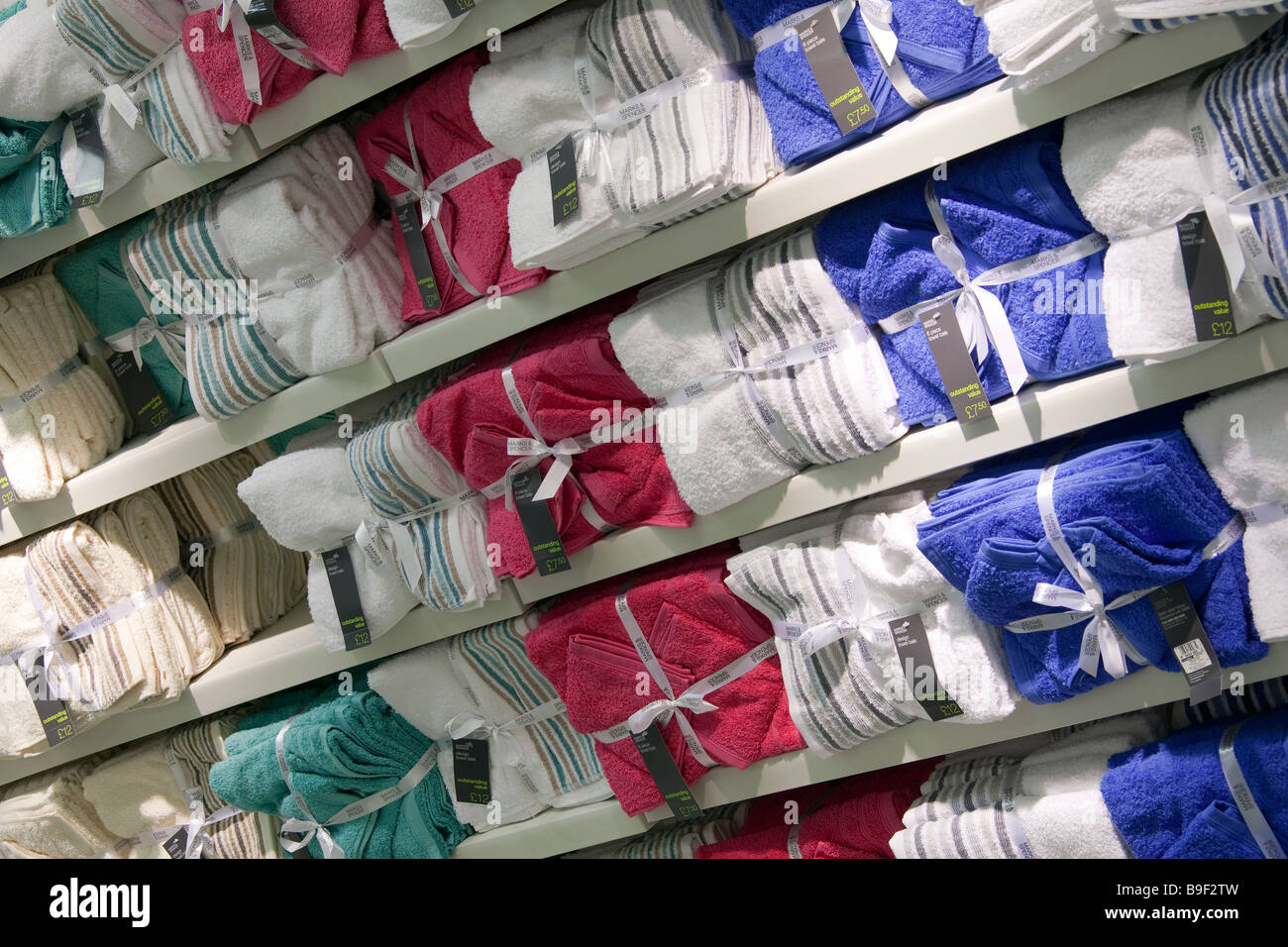 Interior of a retail shop displaying towels Stock Photo - Alamy