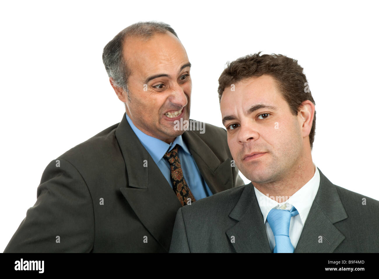 two business men isolated on white background Stock Photo - Alamy