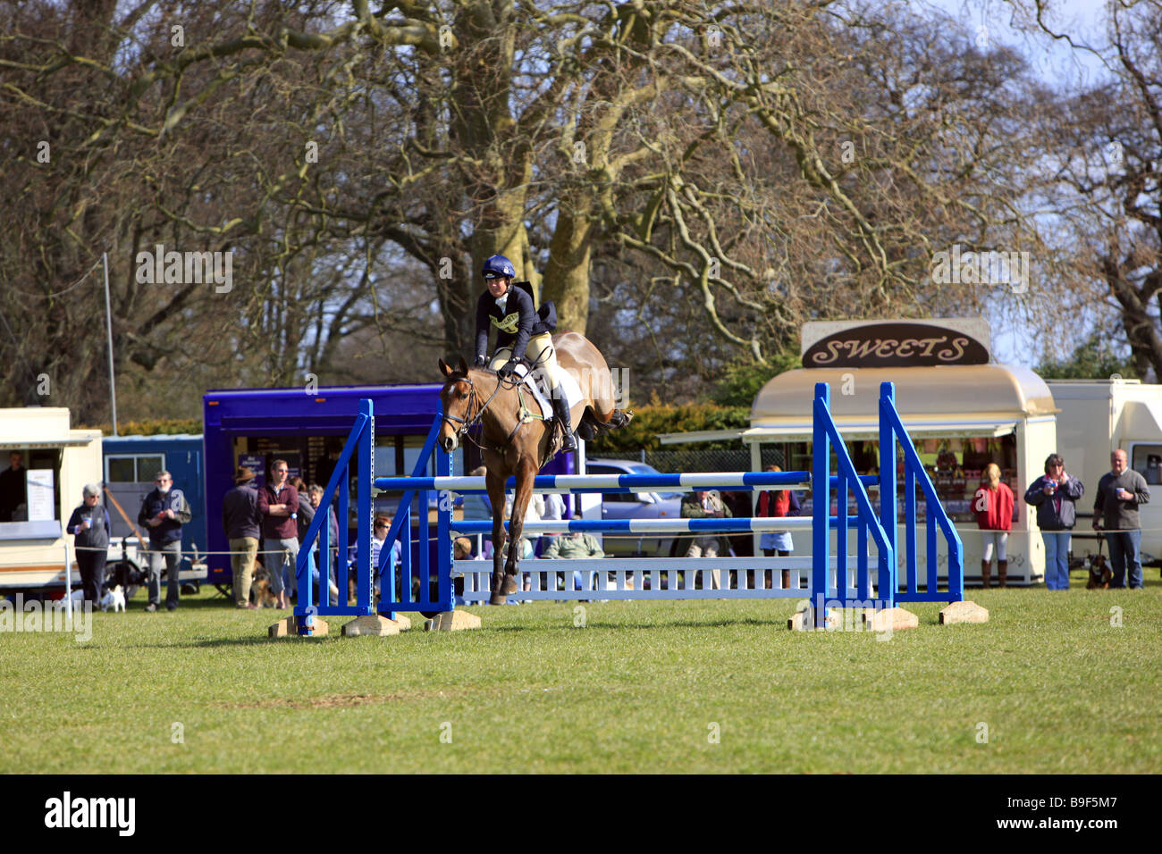 Female rider at a Horse Show Jumping event in rural England Stock Photo ...
