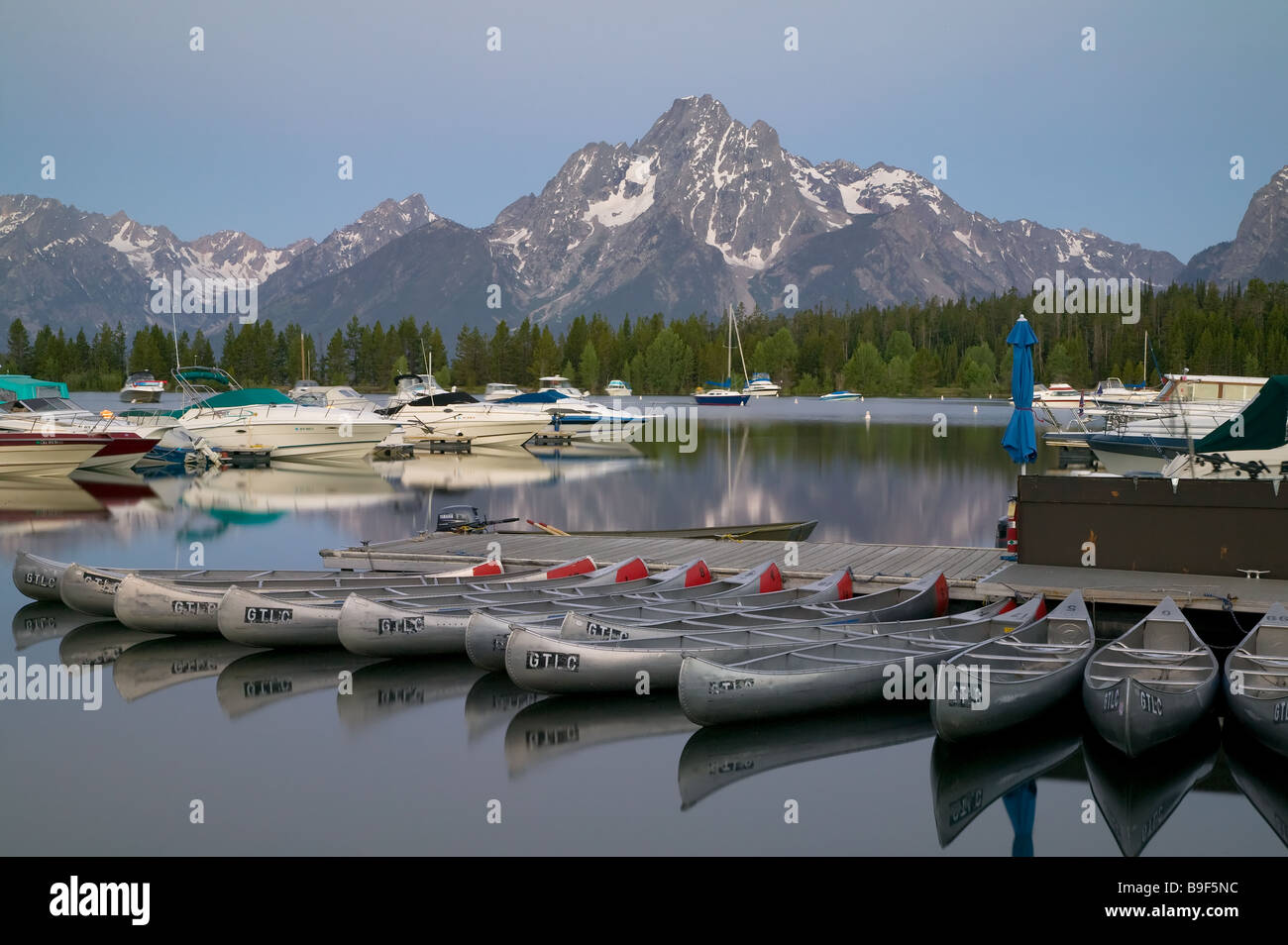 Pre-sunrise view of Mount Moran and the still surface of Jackson Lake ...