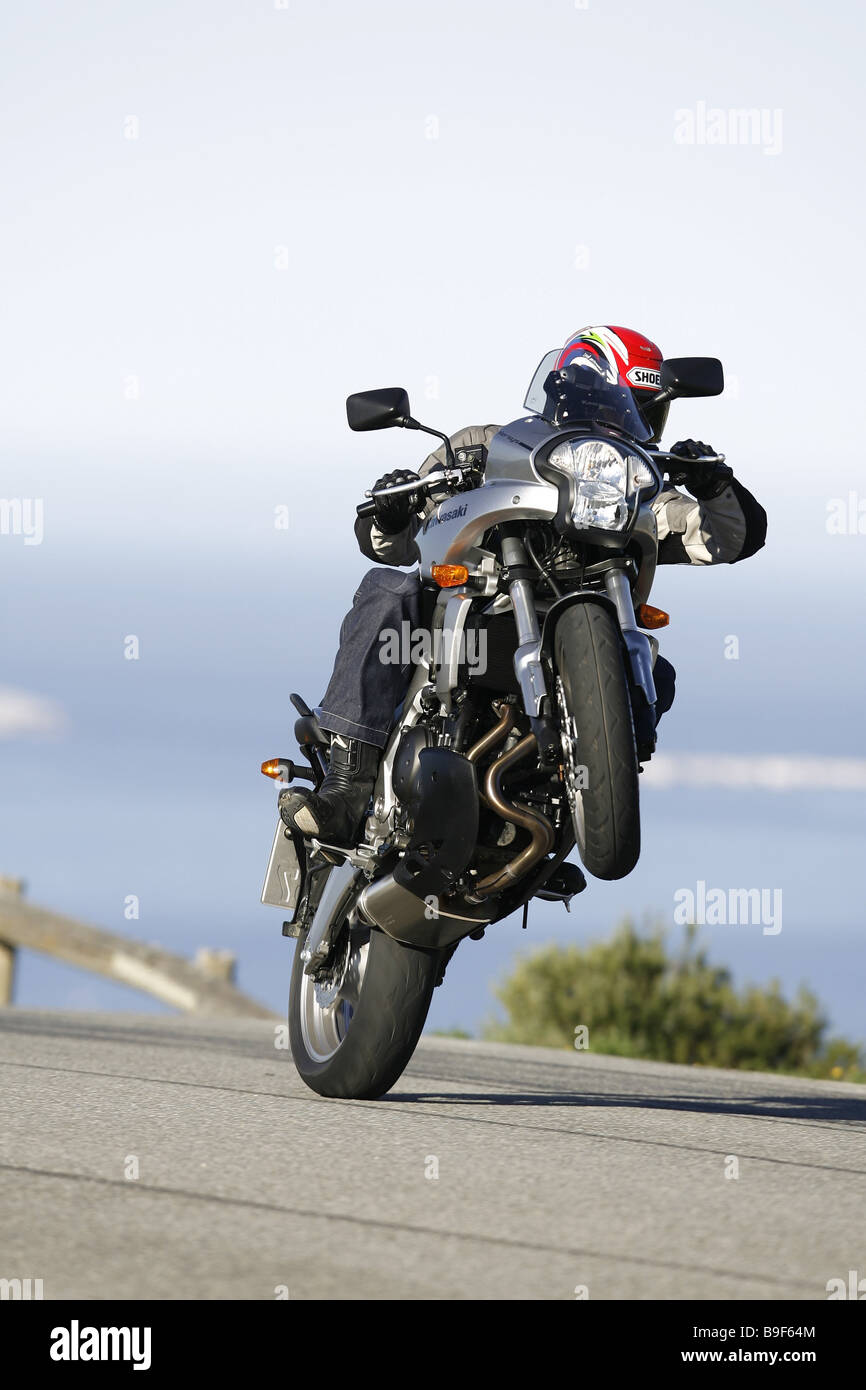 Street motorcyclists Wheelie coast-street people man motorcycle motor ...