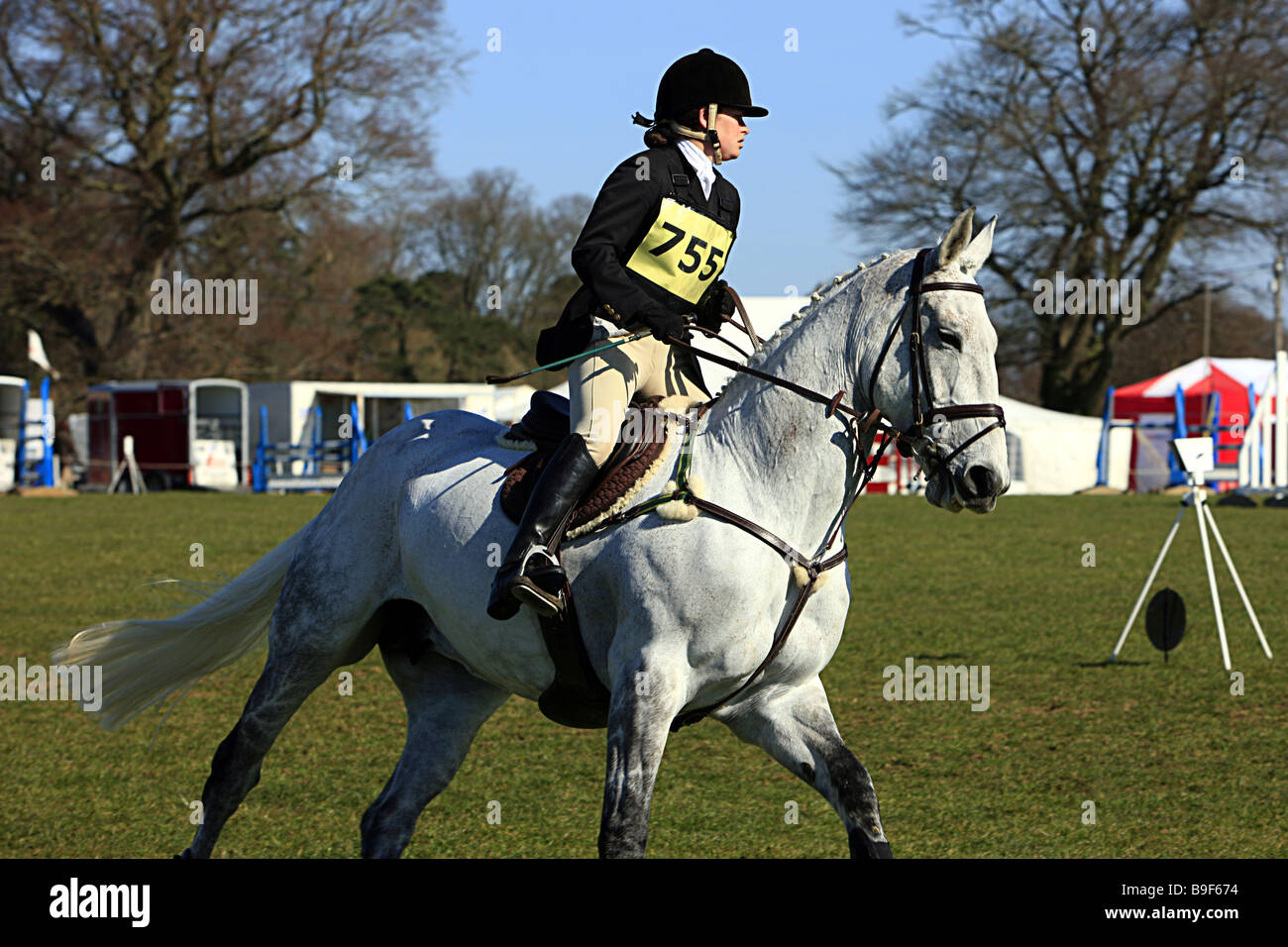 Female rider at a Horse Show Jumping event in rural England Stock Photo ...