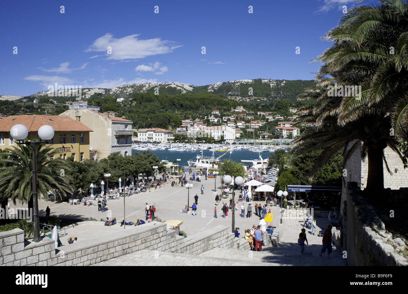 Croatia Dalpatia island Rab city Rab place Trg Sv. Kristofora passers ...