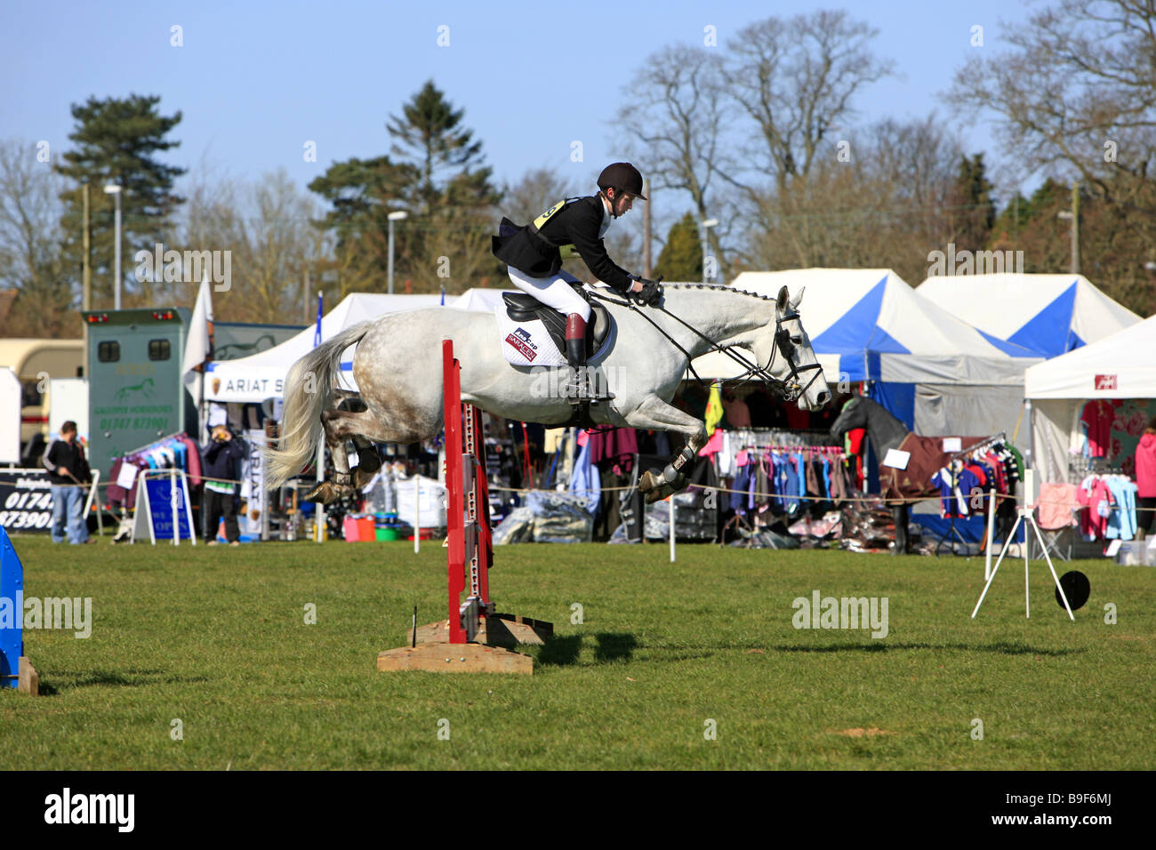 Male rider at a Horse Show Jumping event in rural England Stock Photo ...