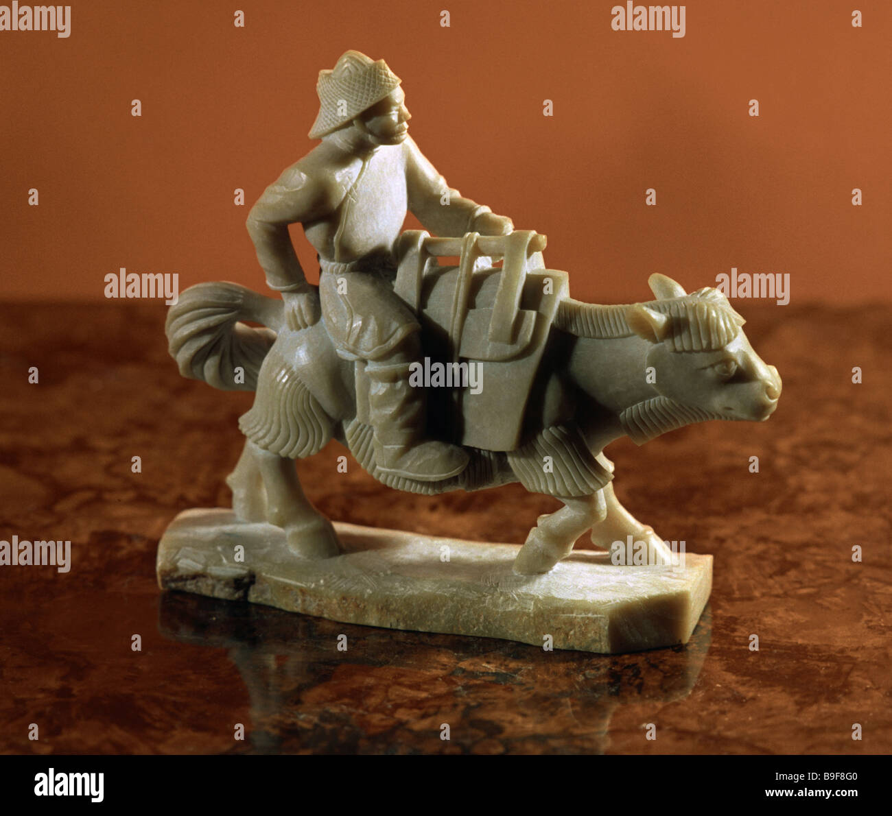 Agalmatolite figurine An ox rider by H Doibu Haa Stock Photo - Alamy