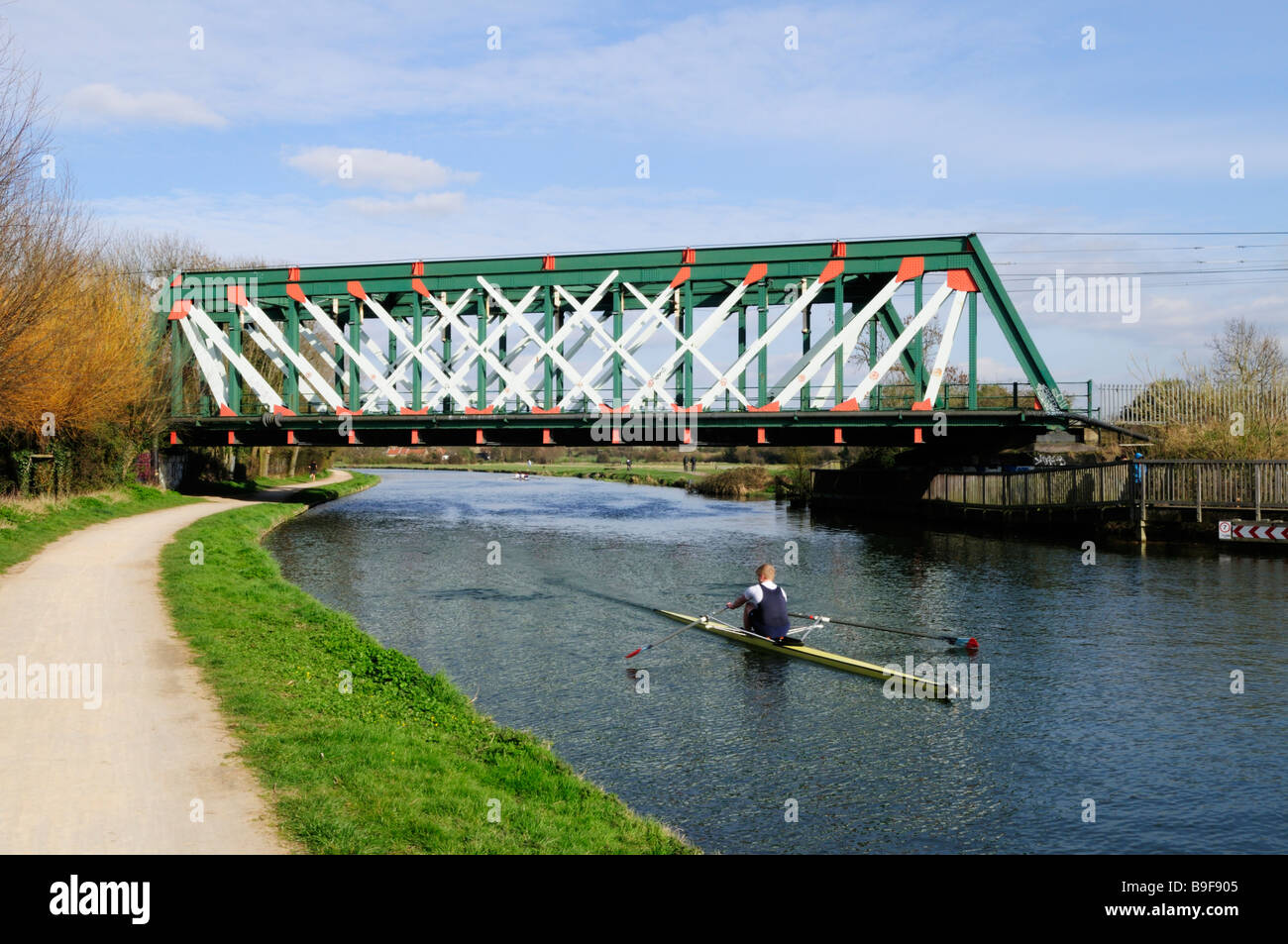 Single Sculler on the River Cam near the railway Bridge at Stourbridge ...
