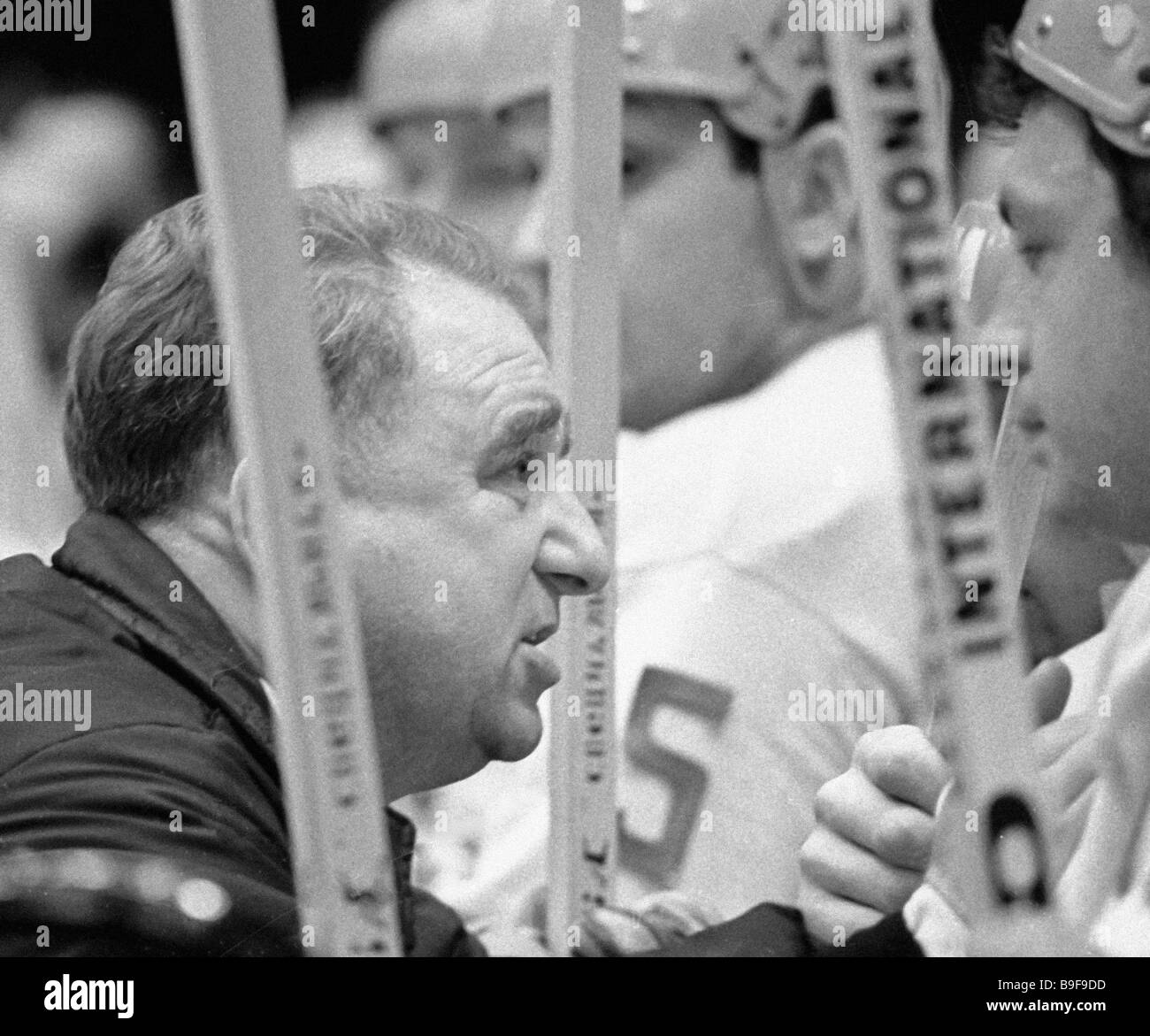 Coach Anatoly Tarasov giving instructions to the USSR national hockey ...