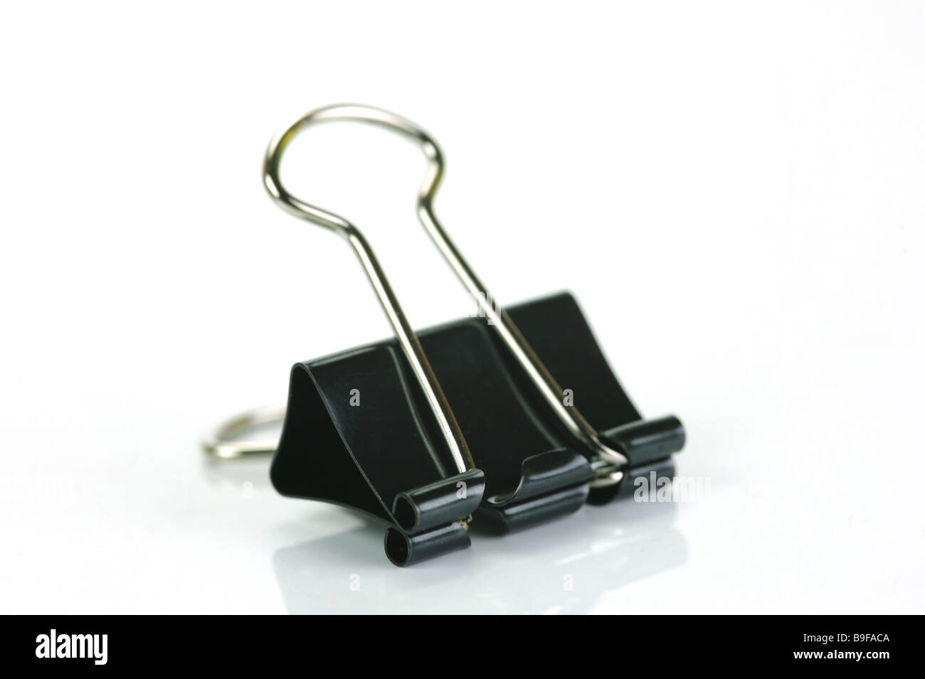 Paper clips isolated against a white background Stock Photo - Alamy