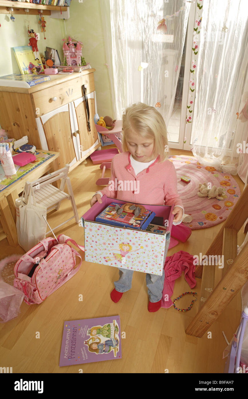 Cleaning up toys hi-res stock photography and images - Alamy