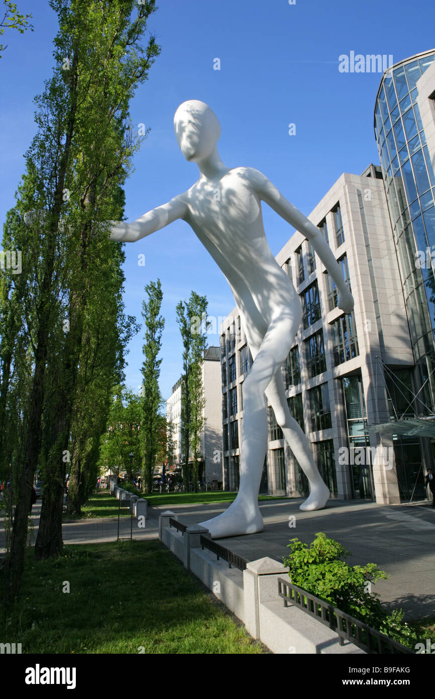 Walking man sculpture munich germany High Resolution Stock Photography ...