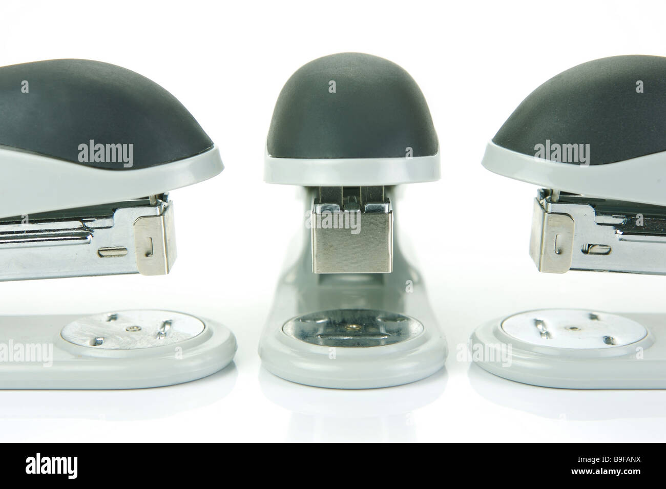 Staplers isolated against a white background Stock Photo - Alamy