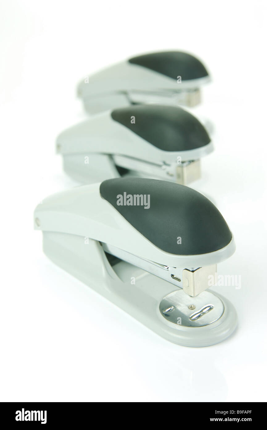Staplers isolated against a white background Stock Photo - Alamy
