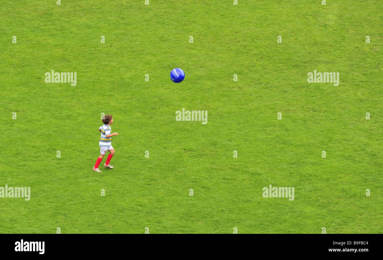 Lonely child football pitch hi-res stock photography and images - Alamy
