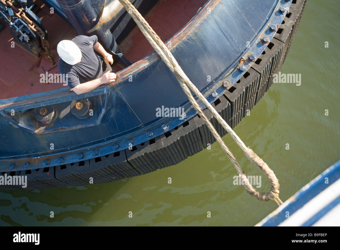 Tugboat Towing a ship in the Harbour of Gothenburg Stock Photo - Alamy