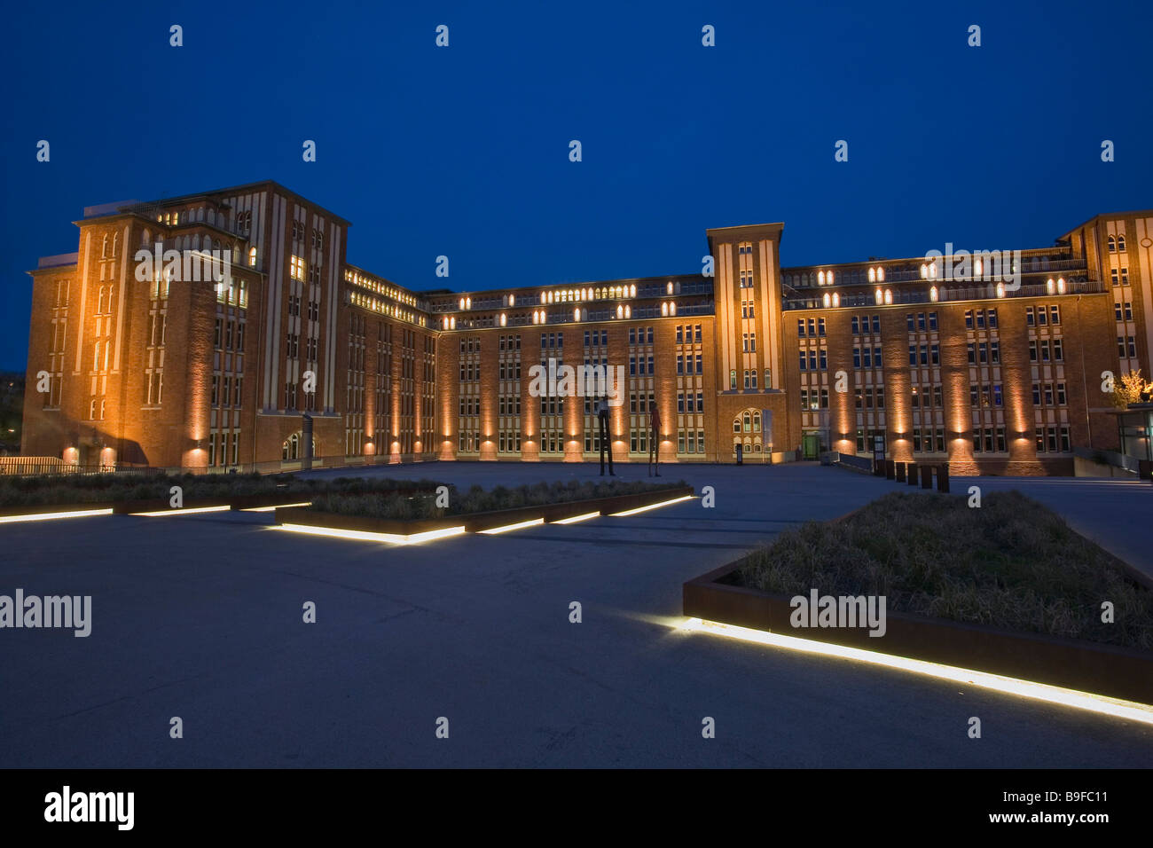 Lit up library at night, Hamburg, Germany Stock Photo - Alamy