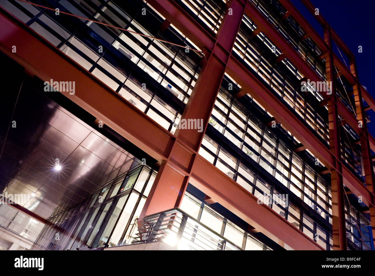 Low angle view of building lit up at night Stock Photo - Alamy