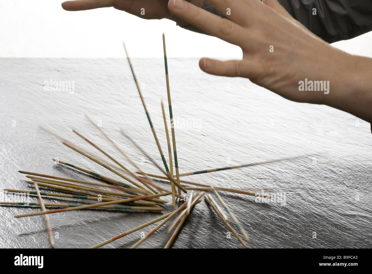 Close-up of falling pick up sticks Stock Photo - Alamy