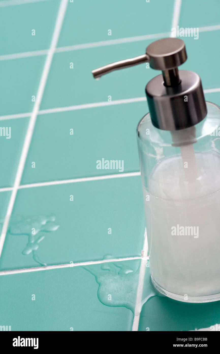 Close-up of bottle of liquid soap on tiled floor Stock Photo - Alamy