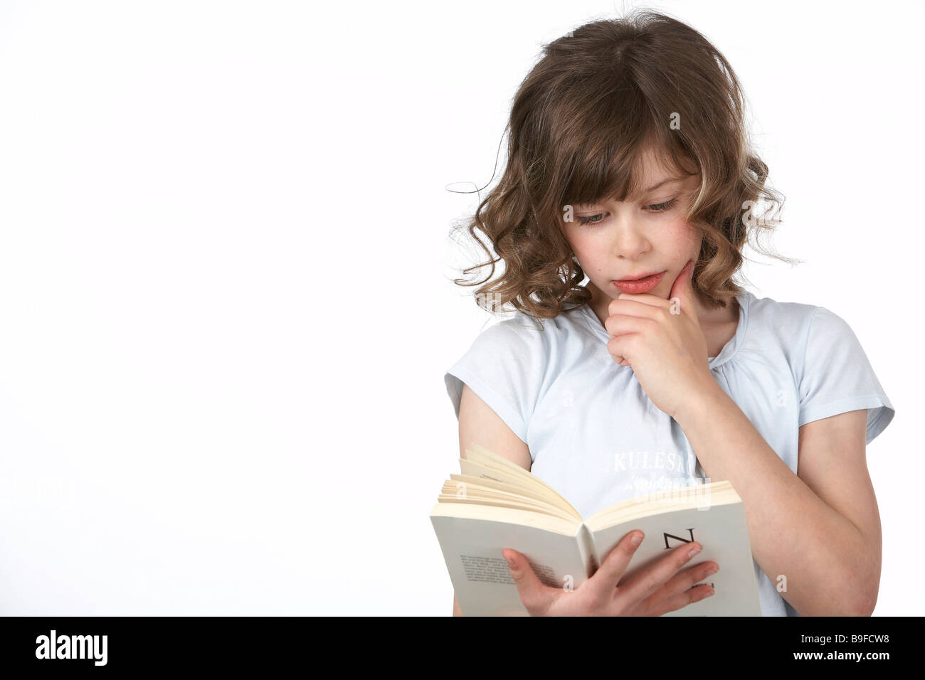 girl reading a book Stock Photo - Alamy