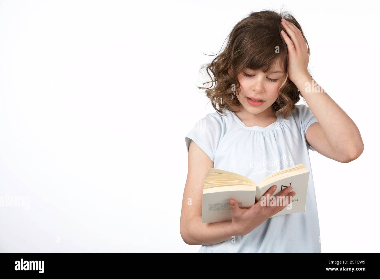 girl reading a book Stock Photo - Alamy