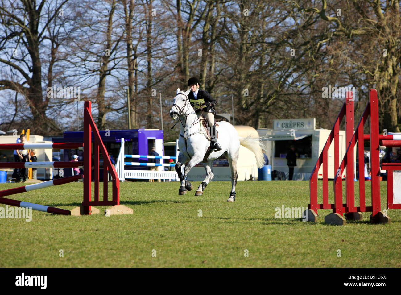 Female rider at a Horse Show Jumping event in rural England Stock Photo ...