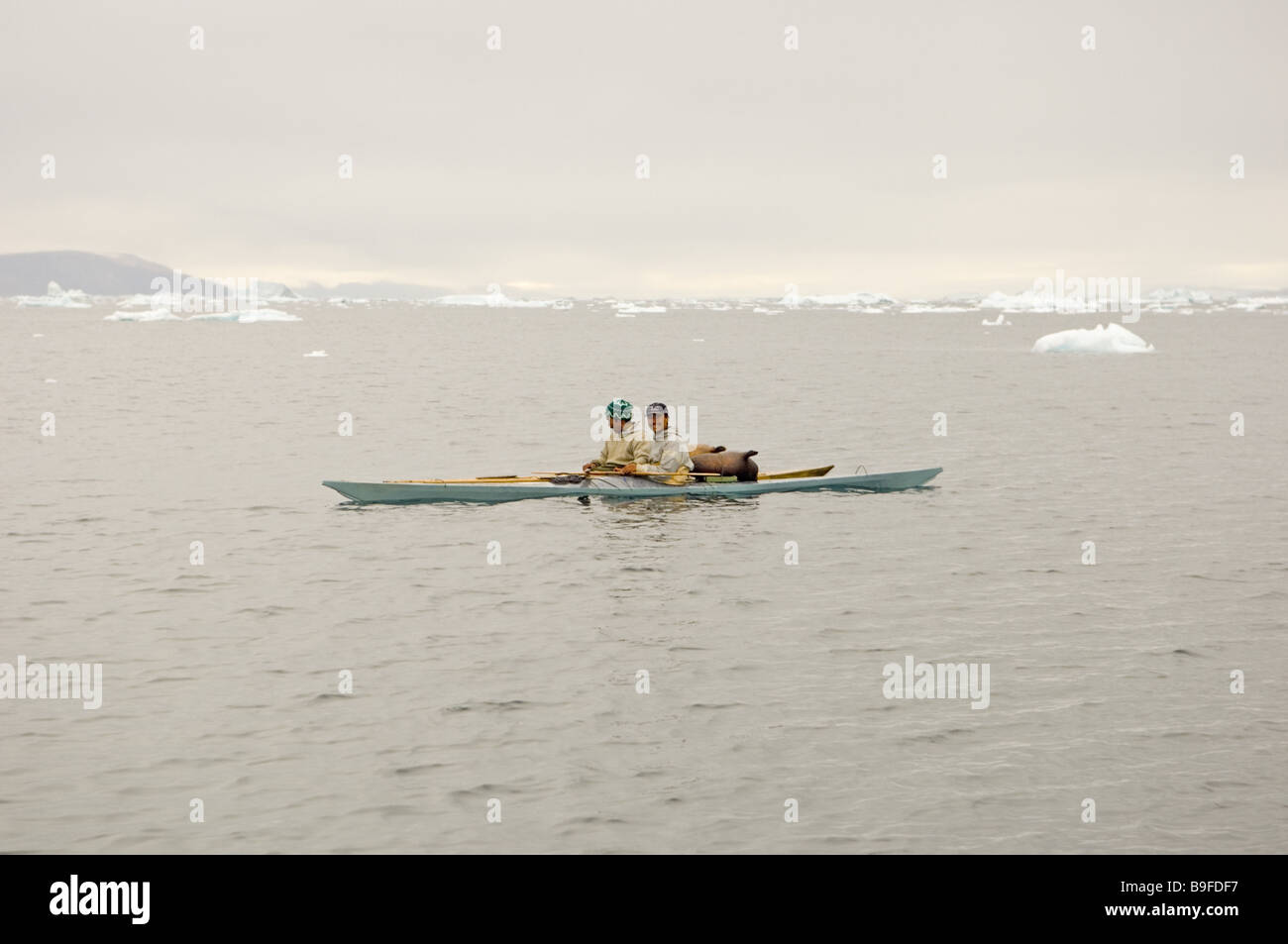 Greenland Qaanaaq-Fjord men Inuit two boat lake drift-ice Boat ice ...
