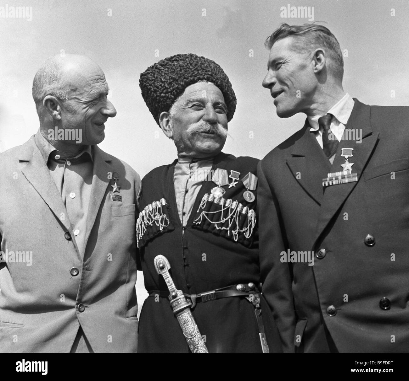 WWII veterans Heroes of the Soviet Union Meliton Kantaria left and Mikhail Yegorov right talk to ...