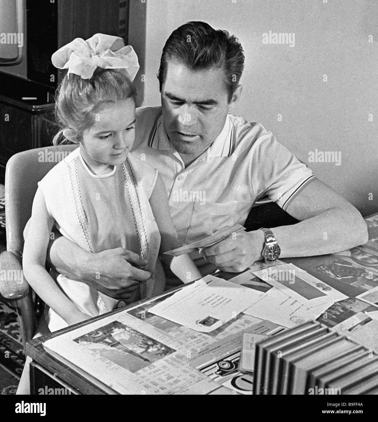 Pilot Cosmonaut Andriyan Nikolayev right with his daughter Alena Stock ...
