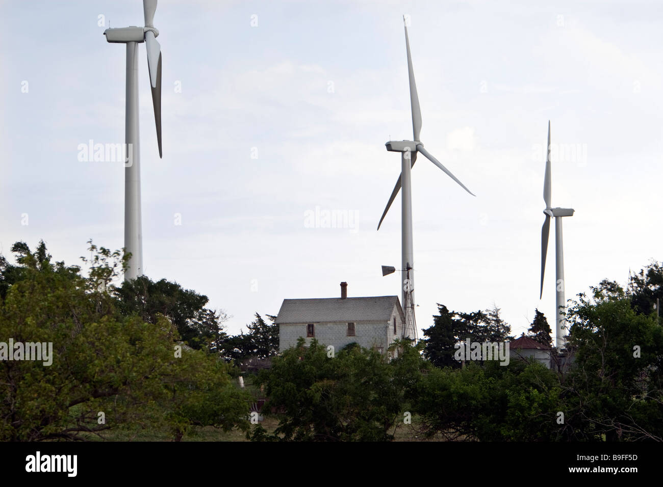 Modern wind turbine and old windmill hi-res stock photography and ...