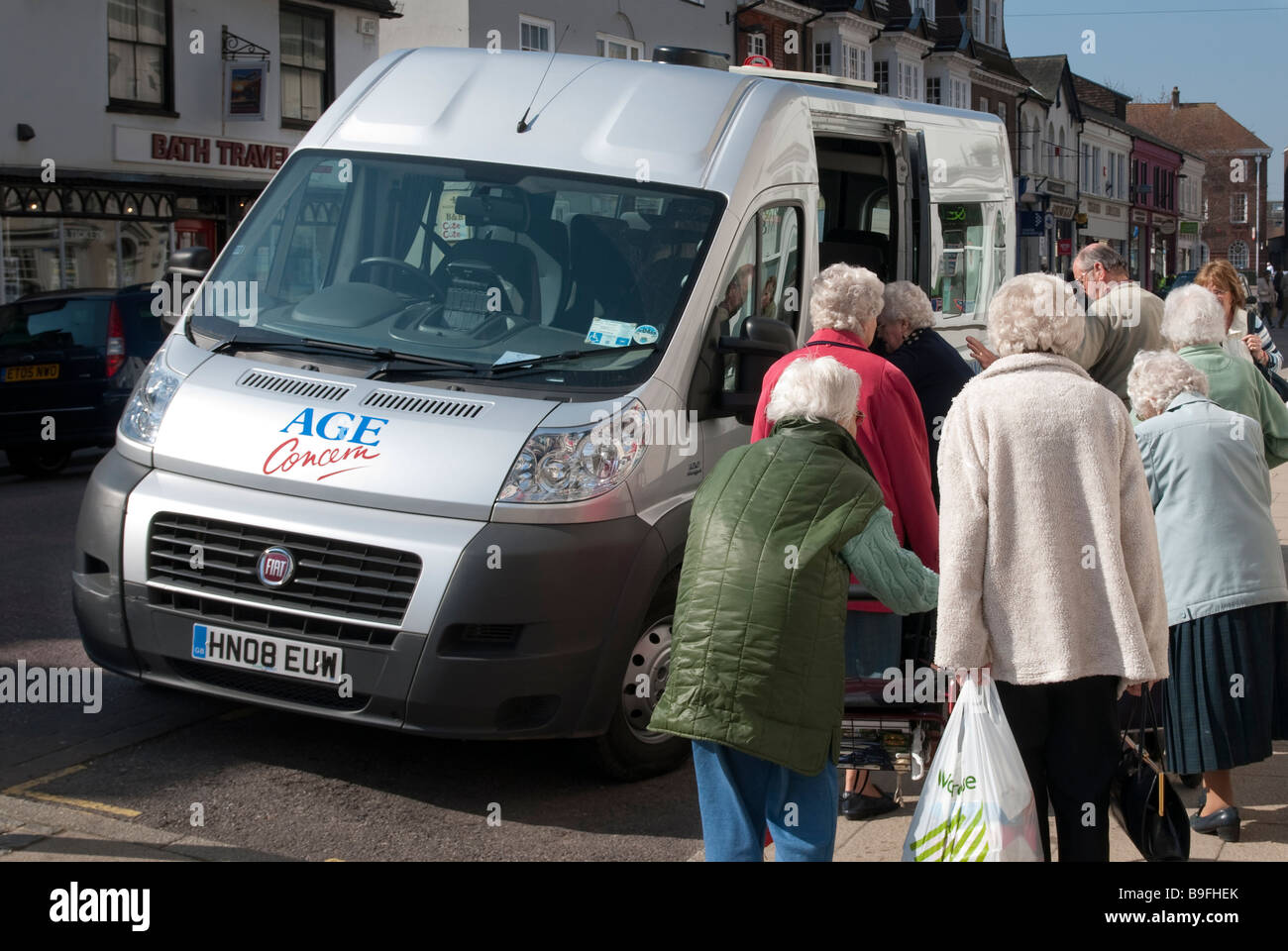 OAP's boarding Age Concern mini bus Stock Photo - Alamy