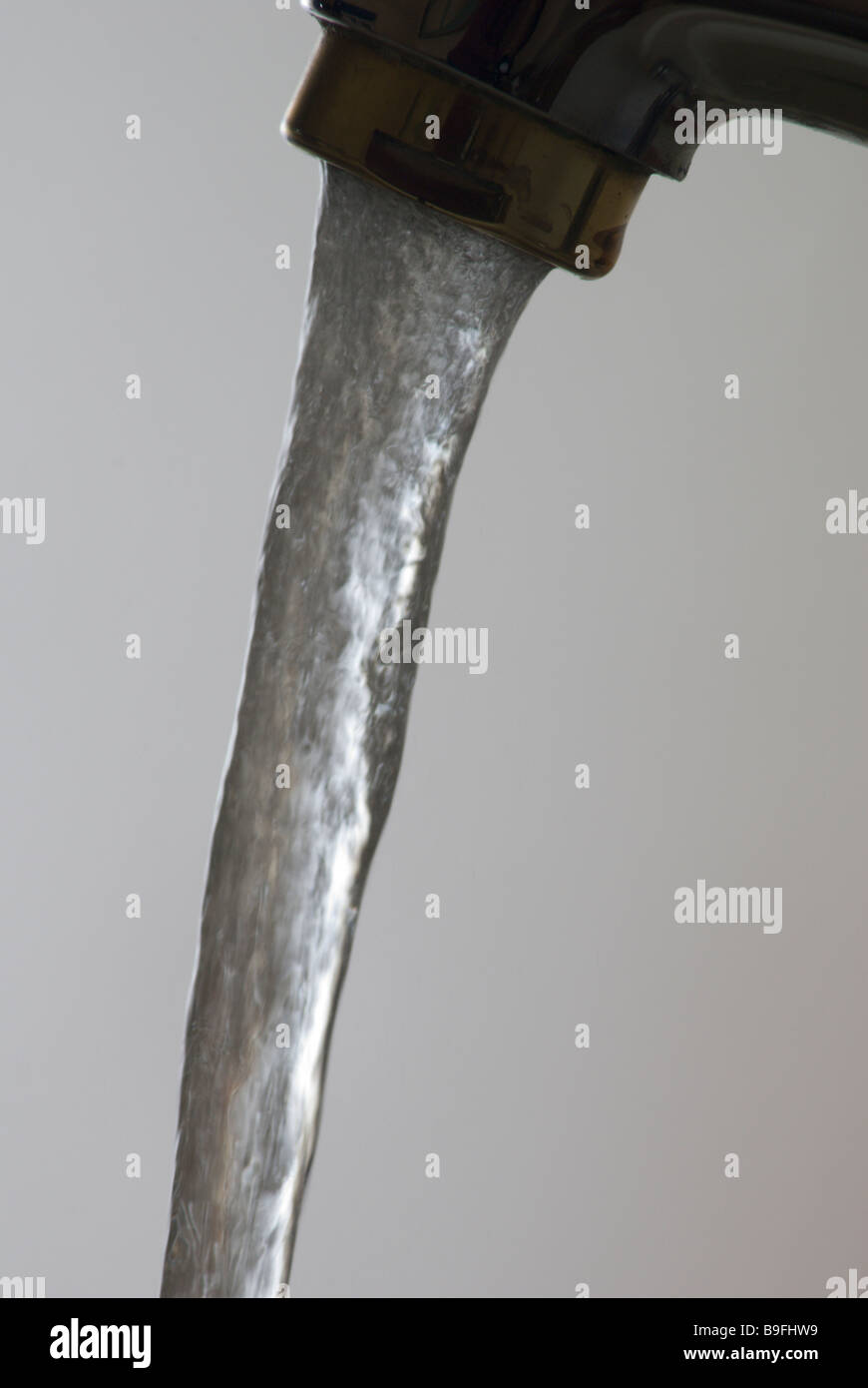 Water flowing from tap Stock Photo - Alamy