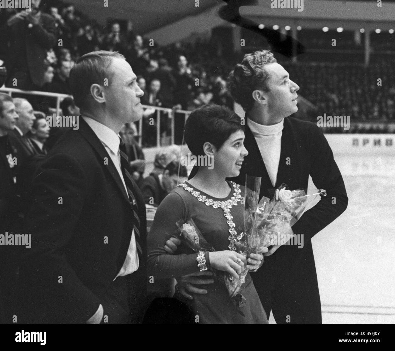 Coach Stanislav Zhuk left and ice skaters Irina Rodnina center and ...