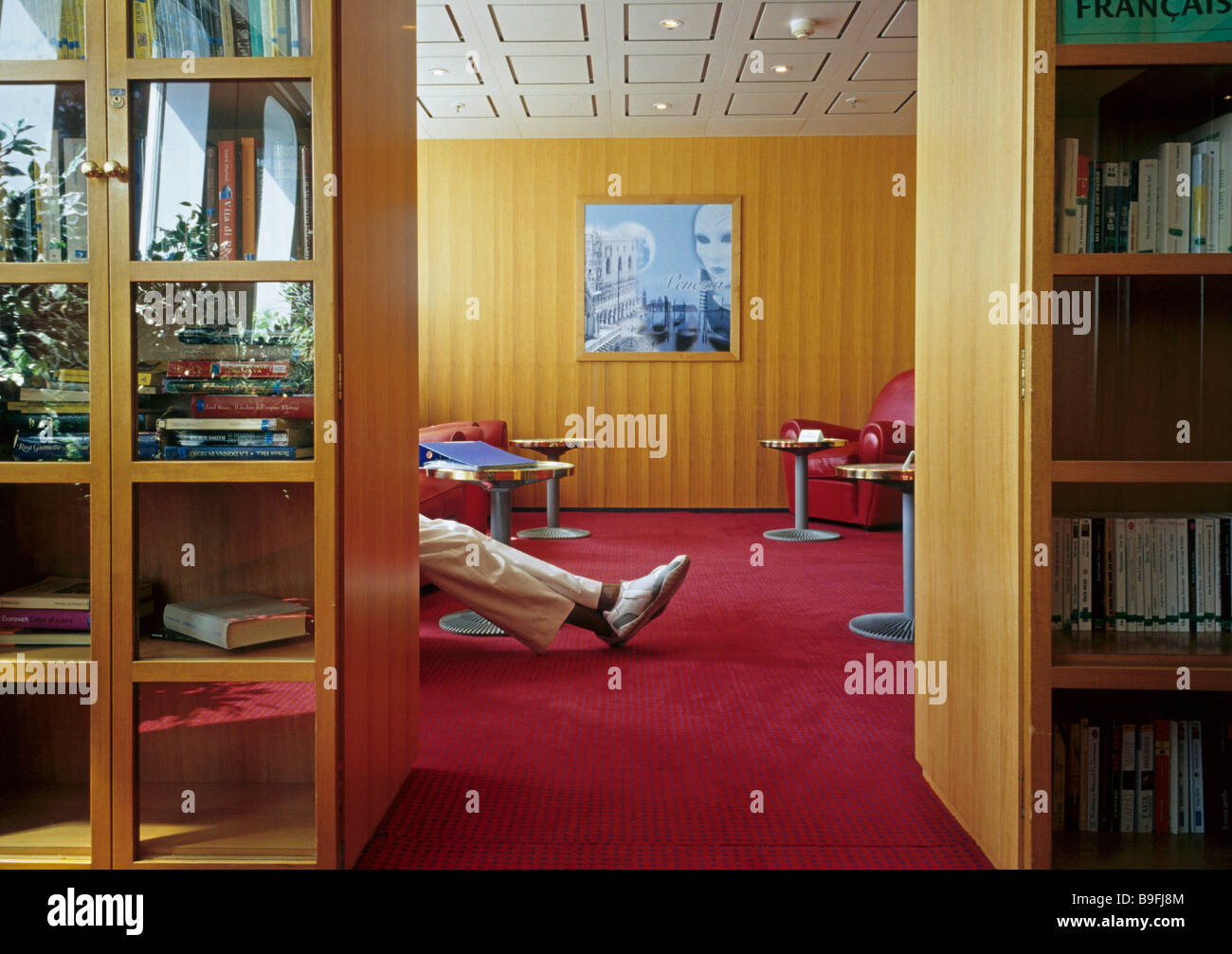 relaxing in the library Stock Photo - Alamy