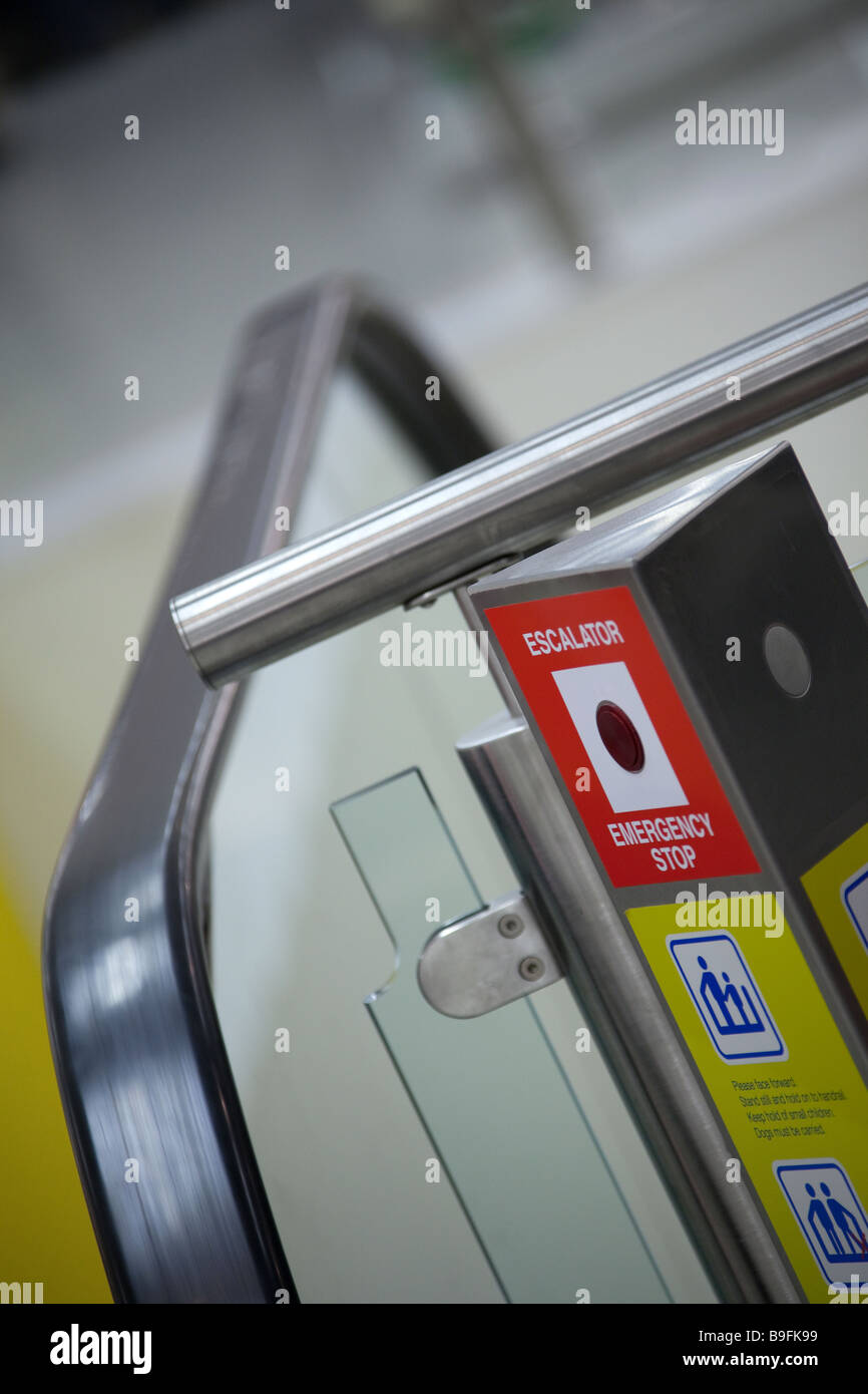 Escalator showing emergency stop button Stock Photo - Alamy
