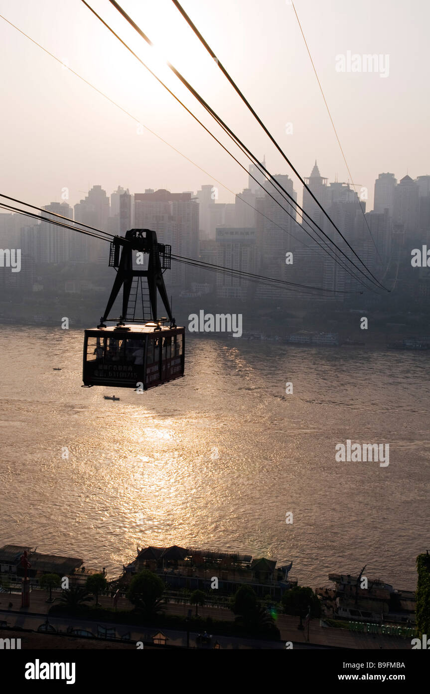 China, Chongqing Municipality. Chongqing city skyline and cable car ...